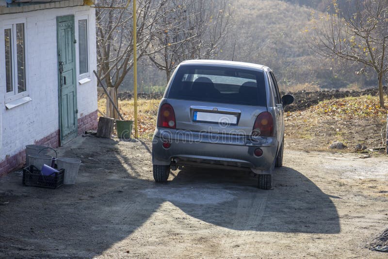 Gray Small Car Near the House Stock Photo - Image of transport ...