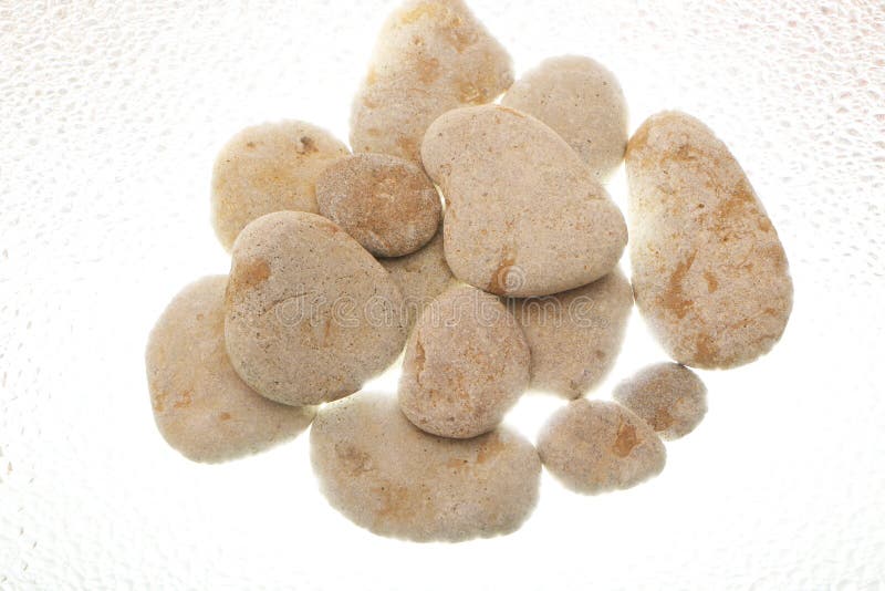 Gray Smooth Sea Stones from the Shore on a White Background. Backlight ...