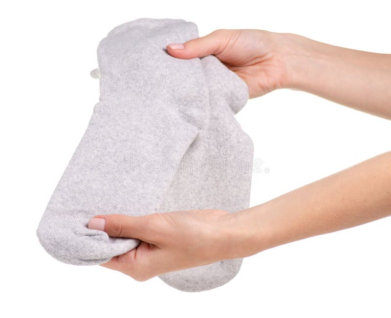 Gray socks in hand stock image. Image of color, grey - 129509427