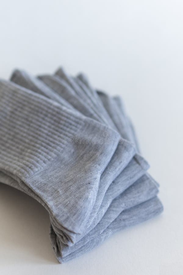 Gray Socks with a Stack of Fan Coloring. Close-up on a White Background ...