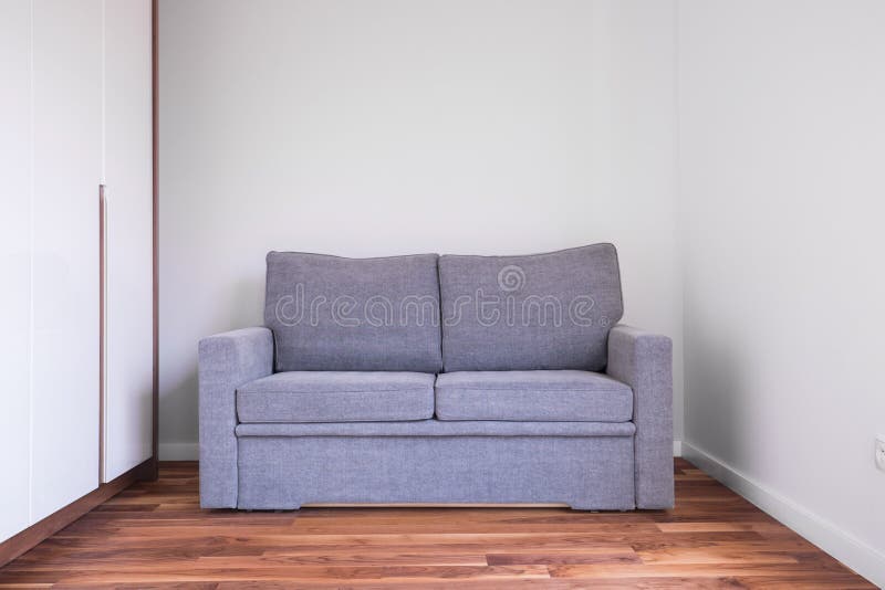 Gray Sofa In Empty Room Stock Photo - Image: 53538793
