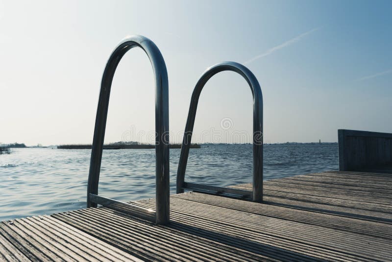 Gray Stainless Steel Pool Ladder Stock Image - Image of seascape ...