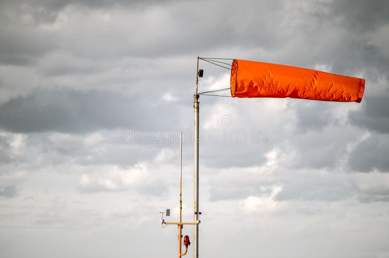 Gray Steel Sky with Fire-red Airsock Stock Photo - Image of sign ...