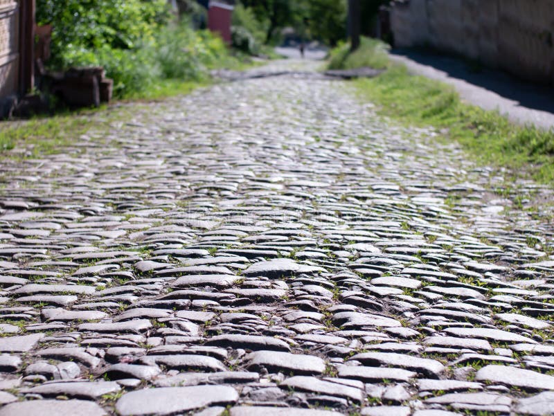 Stone Paving Road on a Sunny Day Stock Image - Image of earth, flora ...