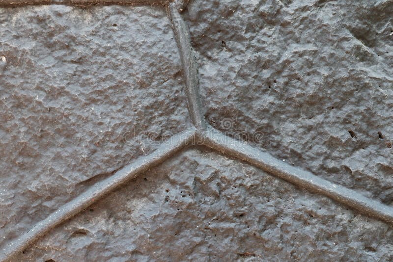 A Gray Stone Wall Texture with a Triangle Pattern in the Middle Stock ...