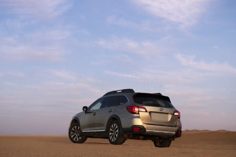 Gray Subaru in the Sand of the Namib Desert at a Bright Sunset ...