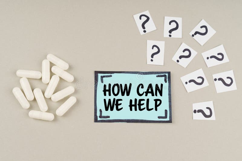 On a Gray Surface There are Question Marks and a Blue Sticker with the ...