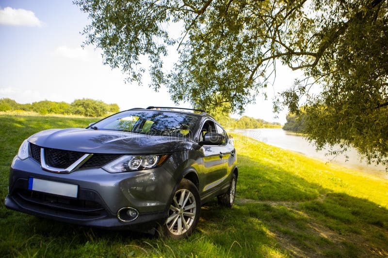 Gray SUV by the River in Nature Stock Image - Image of outdoors, river ...