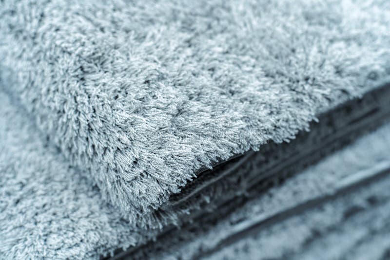 Gray Synthetic Mat with a Large Pile. Samples of Flooring on the ...