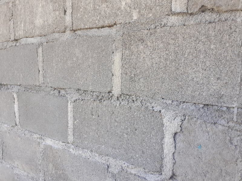Gray Textured Concrete Wall Close-up with Repeating Pattern and Road ...