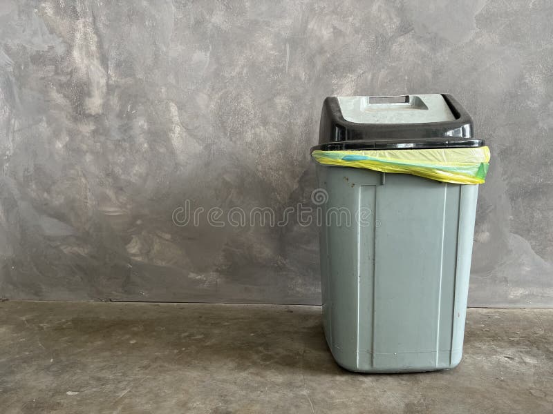 Gray Trash in Front of Concrete Background. Stock Photo - Image of ...