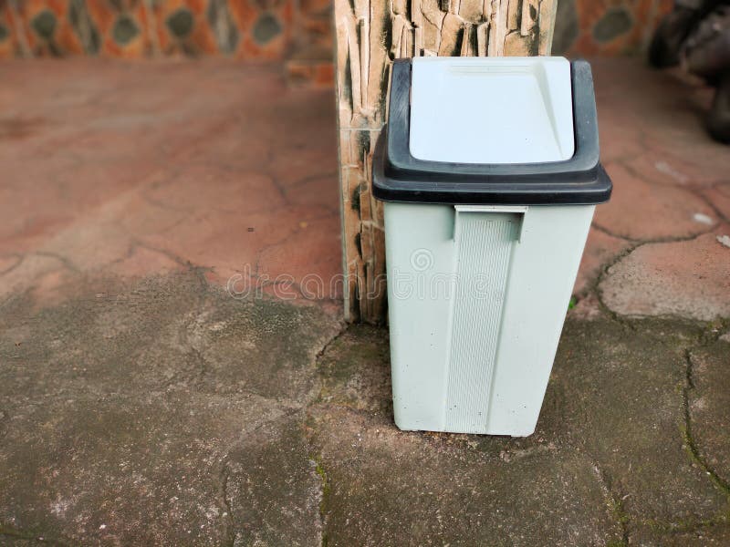 Gray Trash Can in the Front Yard Stock Photo - Image of front, yard ...