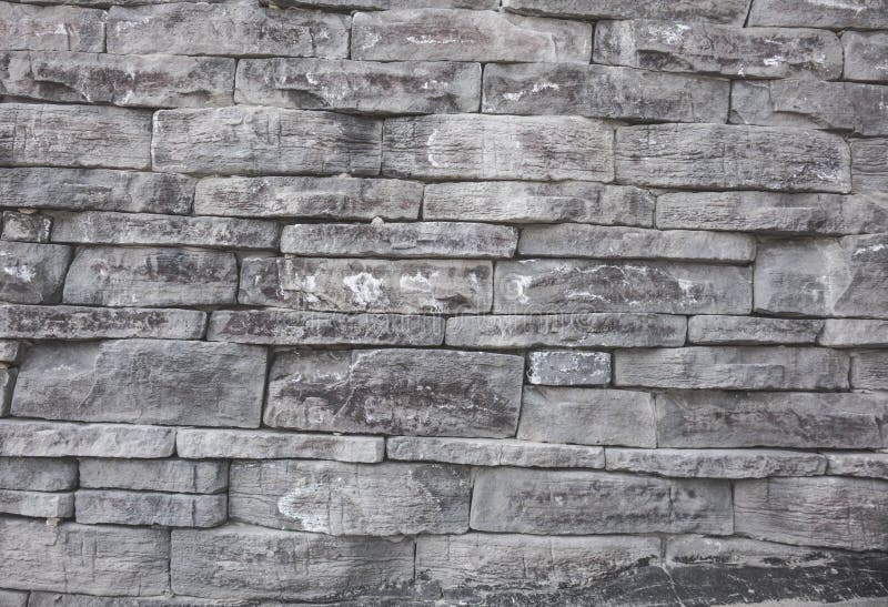 Uneven Stone Wall Texture stock photo. Image of solid - 51257180