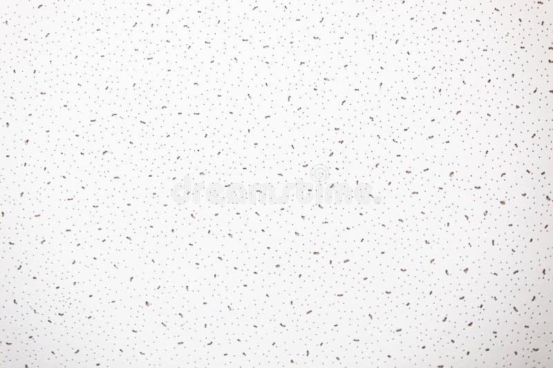 A Gray Wall with a Dark Dotted Texture. Background Stock Photo - Image ...