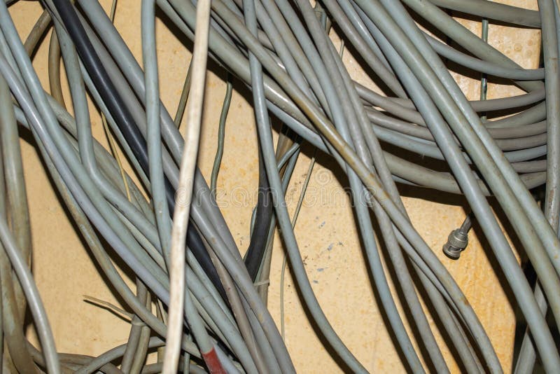 Gray Wires on a Background of a Yellow Wall Stock Image - Image of ...