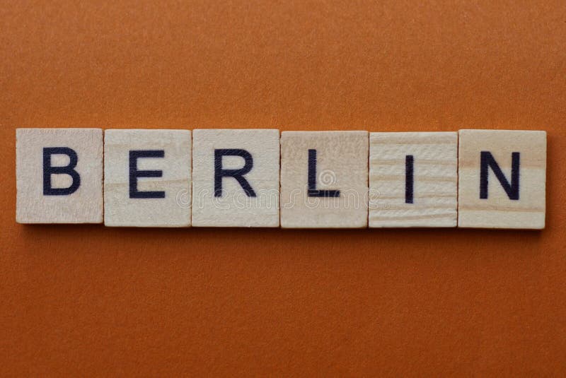 Word BERLIN Formed by Alphabet Blocks on Atlas Map Stock Photo - Image ...
