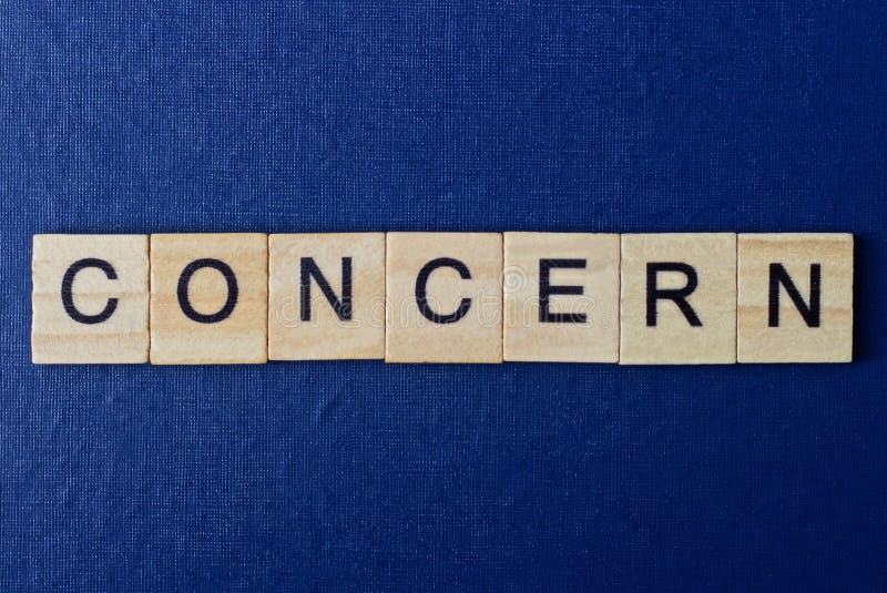 Gray Word Concern in Small Square Wooden Letters with Black Font Stock ...