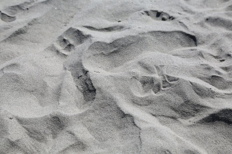 Grayscale Beach Shore Sand with Few Rocks in Frame Stock Photo - Image ...