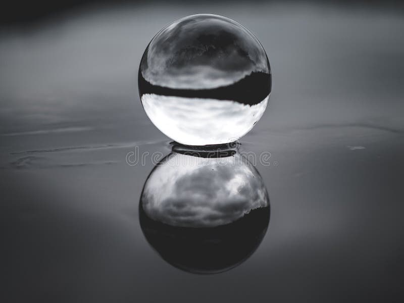 Grayscale Closeup of a Lens Ball on Ice. Stock Image - Image of white ...