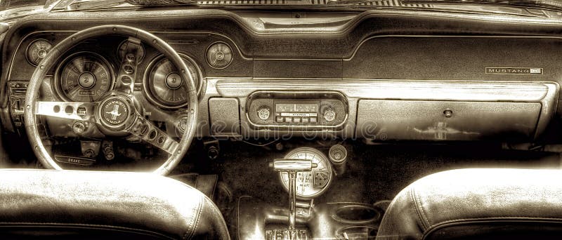Grayscale of the Dashboard and the Steering Wheel of a Classic Ford ...