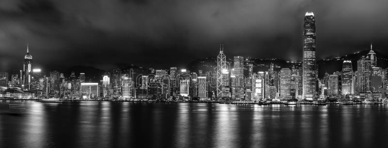 Grayscale of an Illuminated City on a Gloomy Night Stock Image - Image ...