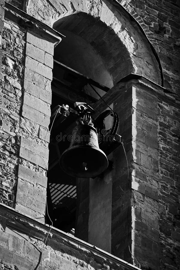 Grayscale of a Large Bell Suspended on the Wall of an Outdoor Structure ...