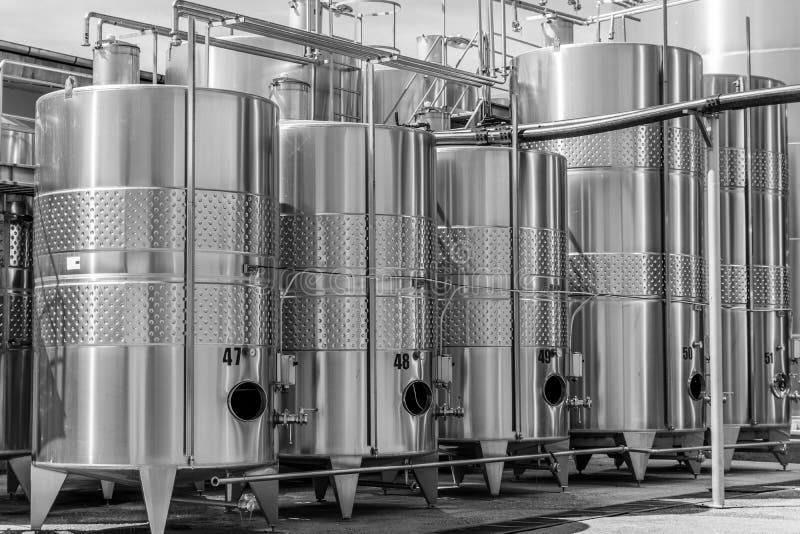 A Grayscale of Metal Winemaking Facilities in a Factory in Cotnari ...