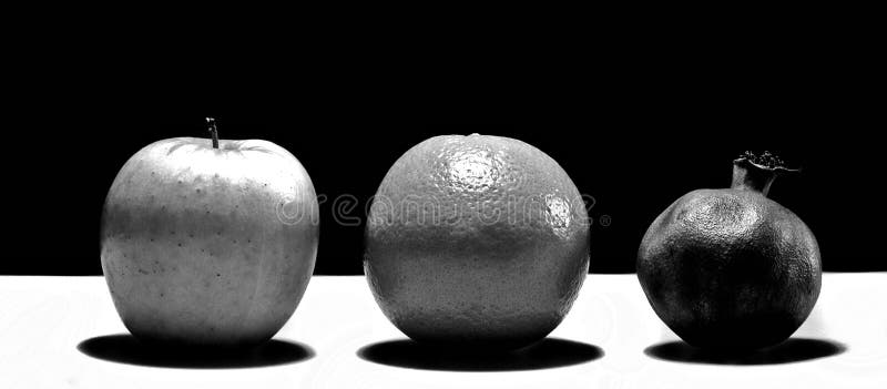 Grayscale Photo of an Apple, an Orange, and a Pomegranate on the Table ...