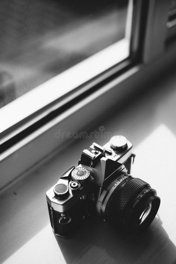 Grayscale Photo Of Classical Camera Near Window Picture. Image: 119467350
