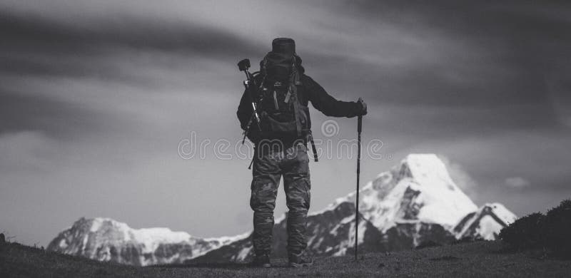 Grayscale Photo of Man Standing on Ground Stock Image - Image of cloud ...
