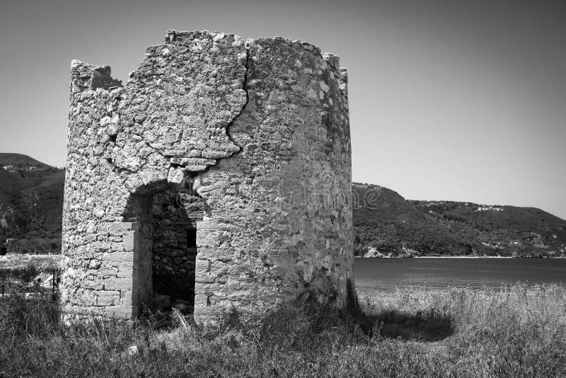 Grayscale Shot of Ancient Building Ruins by the Water Stock Photo ...