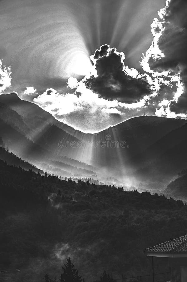 Grayscale Shot of a Dramatic Landscape of Mountains in the Distance ...