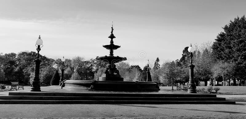 Grayscale Shot of Park with a Large Fountain Stock Photo - Image of ...