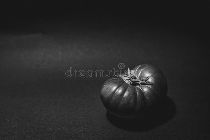 Grayscale Shot of a Ripe Spanish Tomato on a Solid Tabletop, Isolated ...