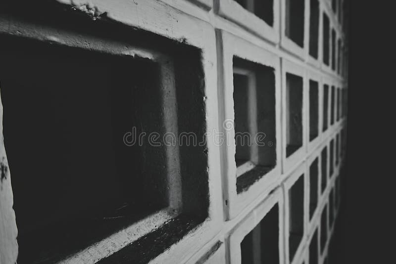 Grayscale Shot of Wall with Square Holes Stock Photo - Image of design ...