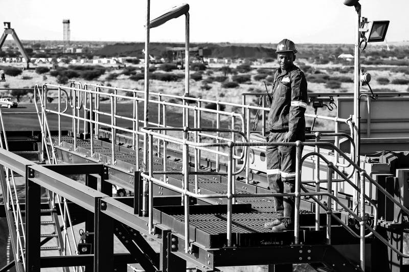 Workers in Mining Equipment at the Underground Platinum Mine in ...