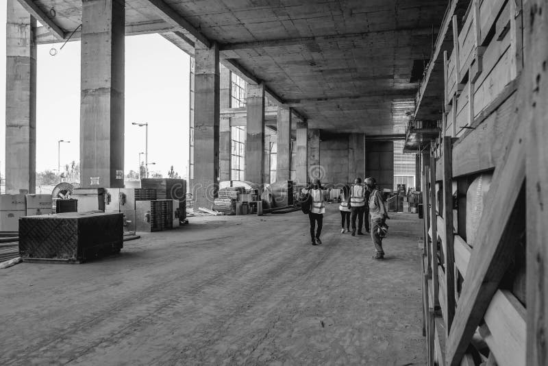 Grayscale of Workers with Uniform at Building Construction in Lusail ...