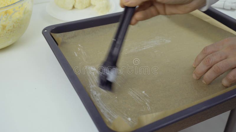 Grease a Baking Sheet Greasing Baking Tray Covered with Baking Paper ...