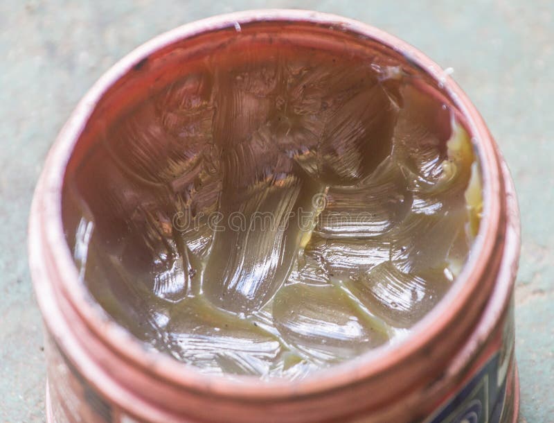 Grease is a Lubricant, Assistant To the Machines. Stock Photo - Image ...