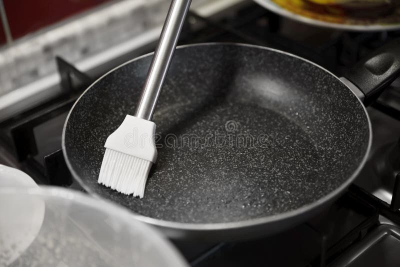 Pot and Frying Pan on Stove in Kitchen Stock Photo - Image of color ...