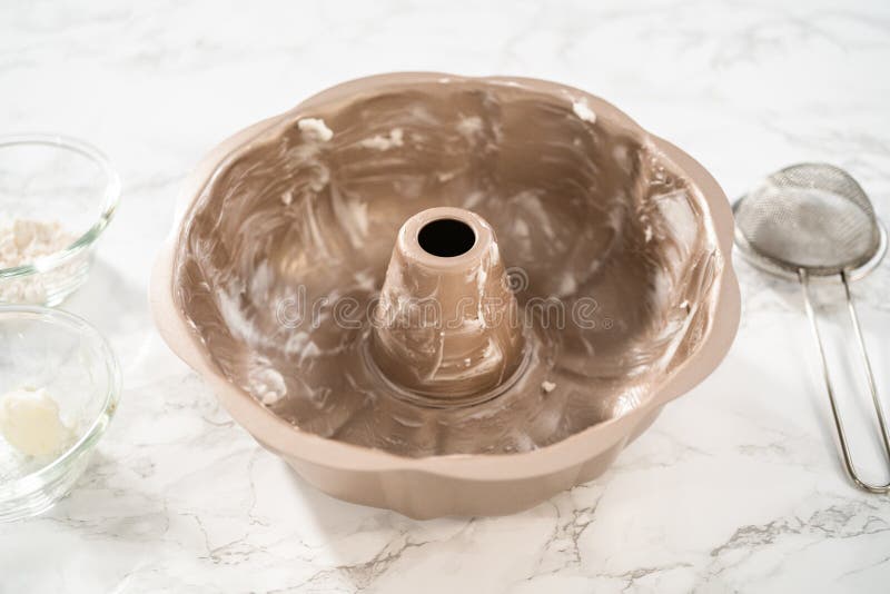 Greasing baking pan stock photo. Image of baking, preparing - 286133426