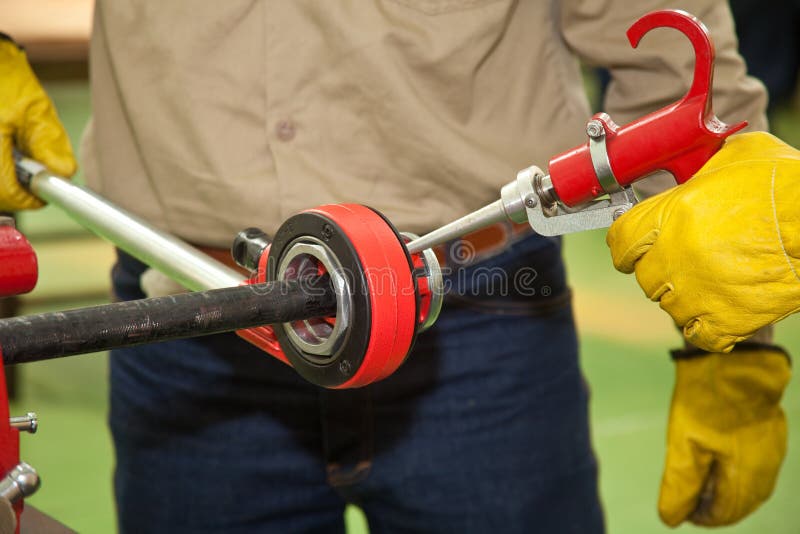 Greasing a tool stock photo. Image of laboring, metal - 70919240