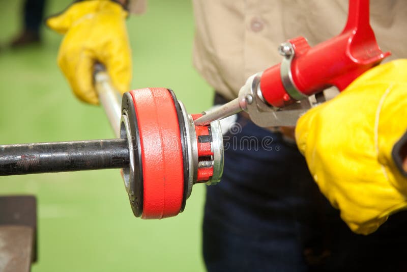 Greasing a tool stock photo. Image of laboring, metal - 70919240