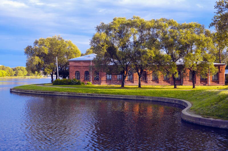 Great Ancient Brick Building on the Lake Shore Stock Photo - Image of ...