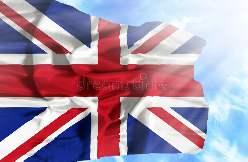 Great Britain Waving Flag Against Blue Sky with Sunrays Stock ...