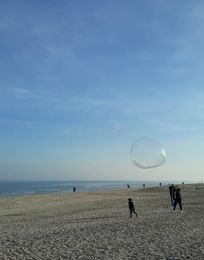 Great bubble at the beach stock photo. Image of cape - 328533236