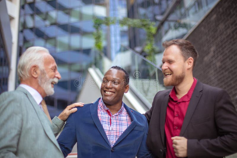 Great Business Team. Three Business Men Talking Stock Image - Image of ...