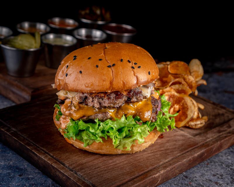 Great Double Beef Burger with Chips Stock Photo - Image of artisan ...