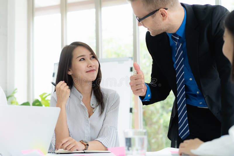 The Boss Encourages the Staff To Do a Very Good Job Stock Photo - Image ...