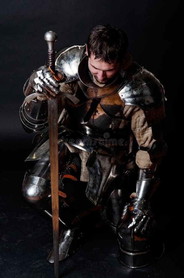 Great Knight Holding His Sword and Helmet Stock Photo - Image of white ...